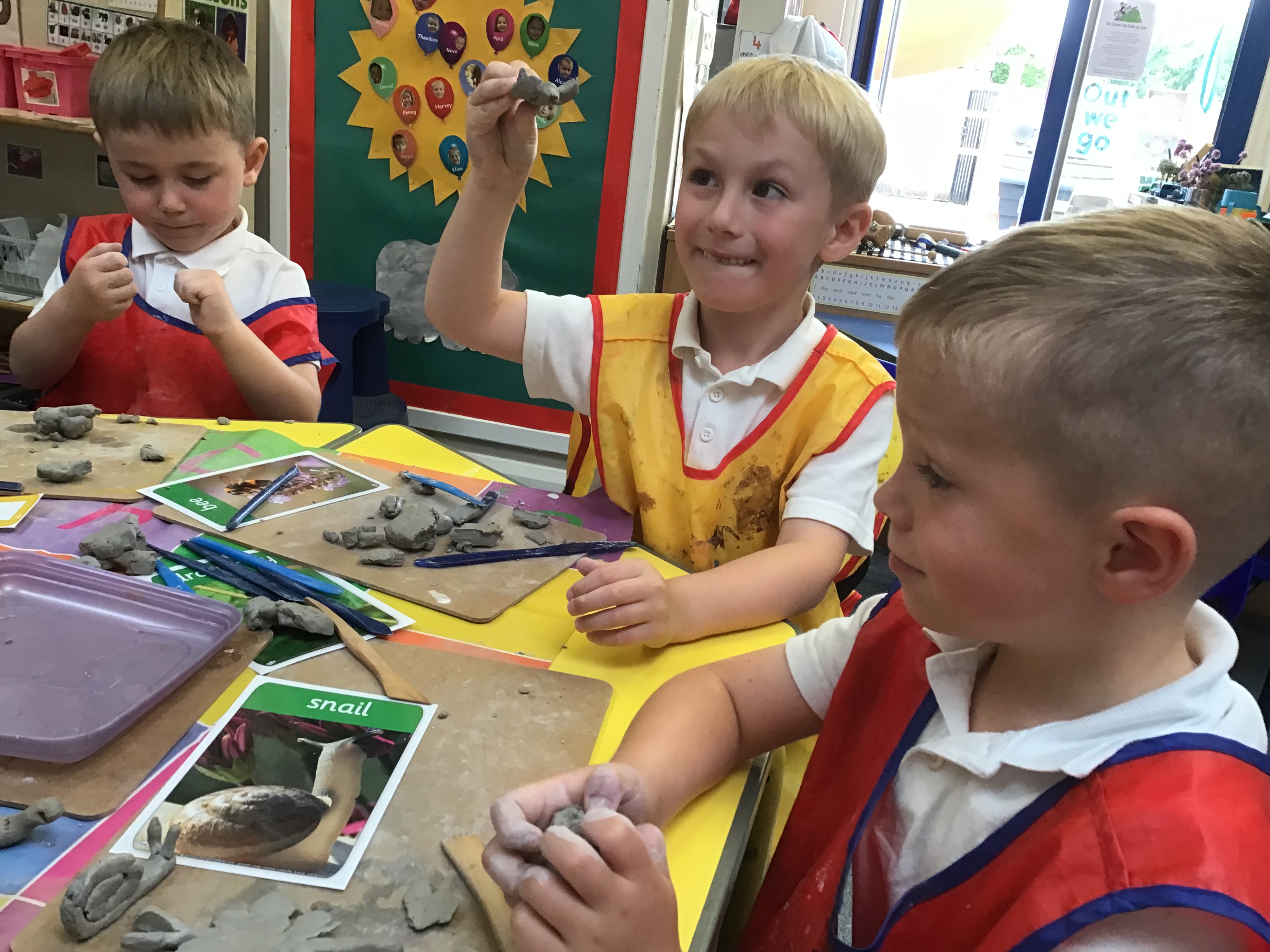 Sculpting with clay and using one handed tools to create minibeasts ...